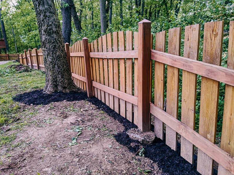 LAYING A MULCH BORDER UNDER OUR FENCE - Grove House Reno